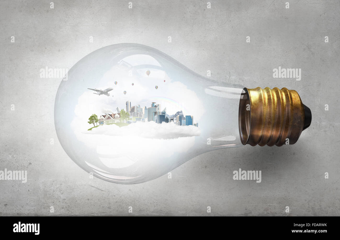 Glass light bulb with green life concept inside Stock Photo - Alamy