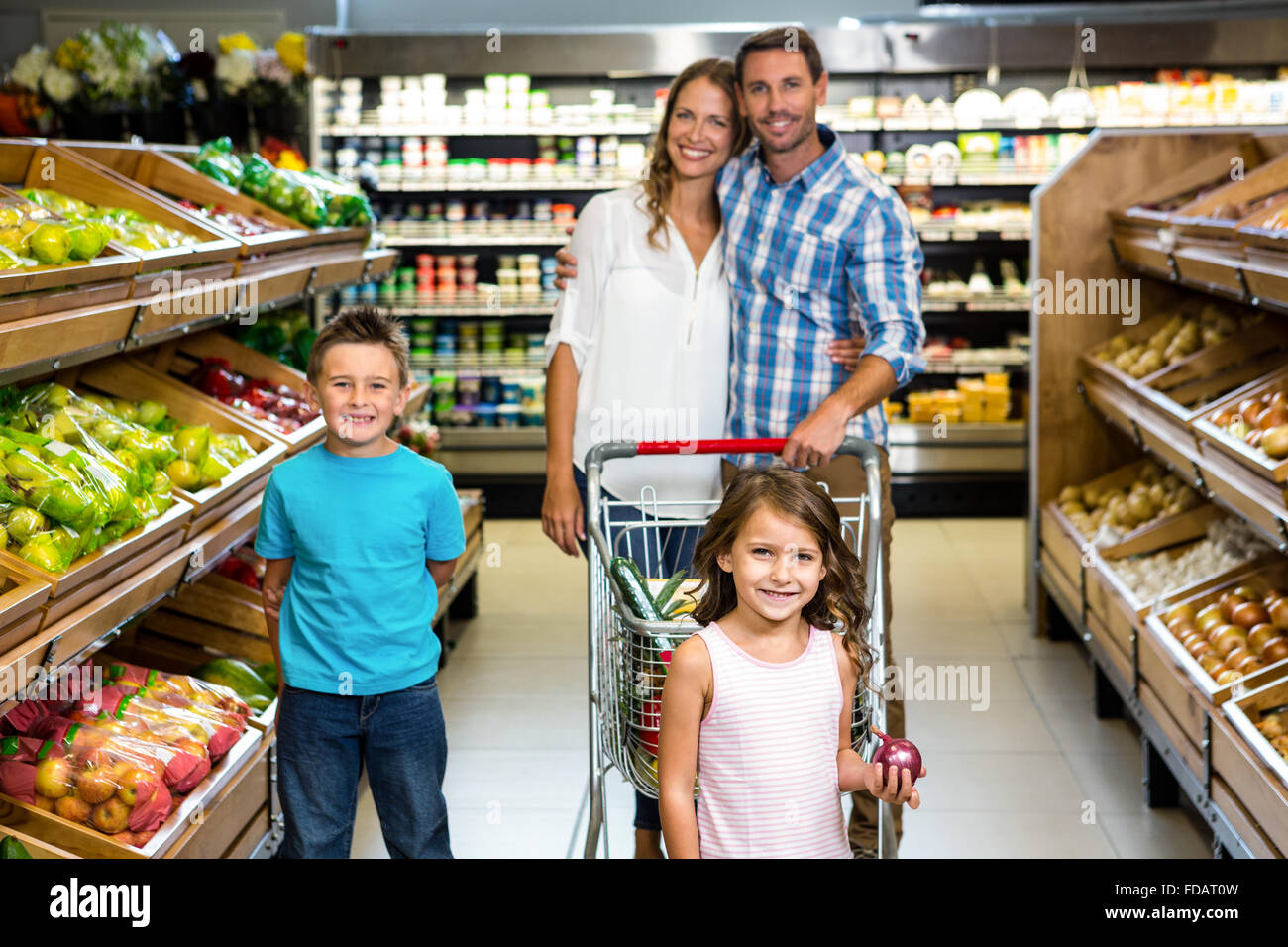 Portrait of family doing shopping Stock Photo - Alamy