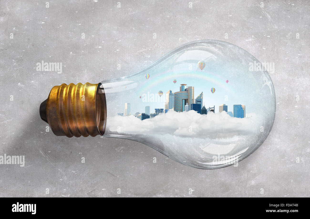 Think green concept with modern cityscape inside of light bulb Stock ...
