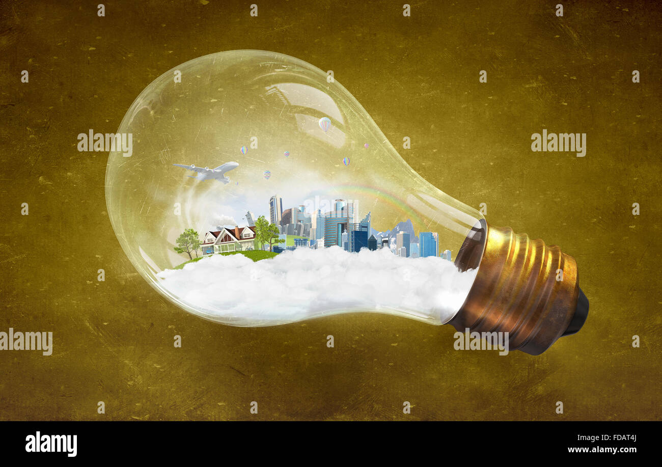 Think green concept with cityscape inside of light bulb Stock Photo - Alamy