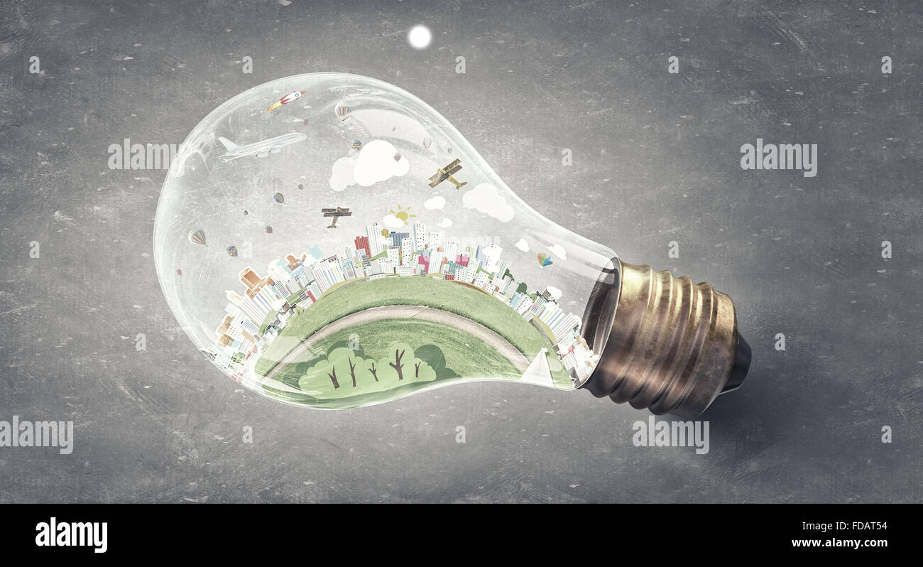 Think green concept with cityscape inside of light bulb Stock Photo - Alamy