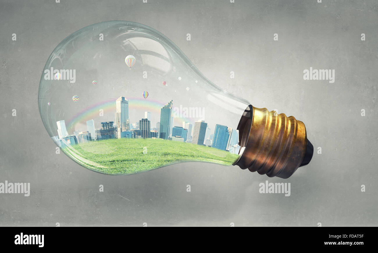Think green concept with modern cityscape inside of light bulb Stock ...