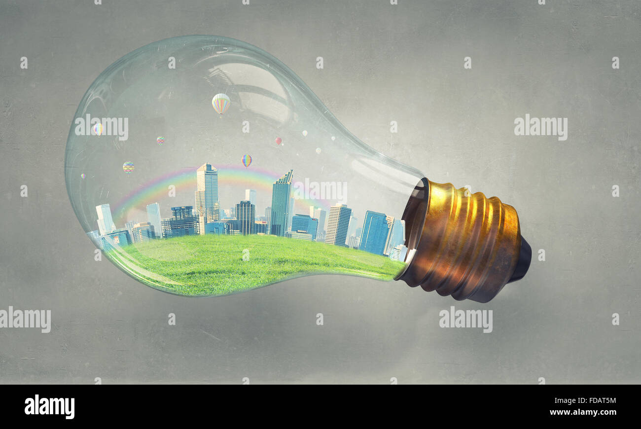 Think green concept with modern cityscape inside of light bulb Stock ...