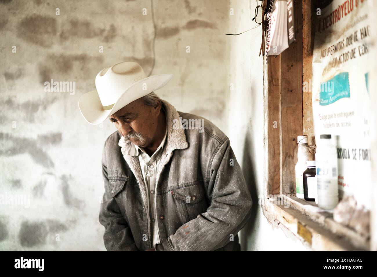 Mexican man inside his house in Baja California Stock Photo - Alamy