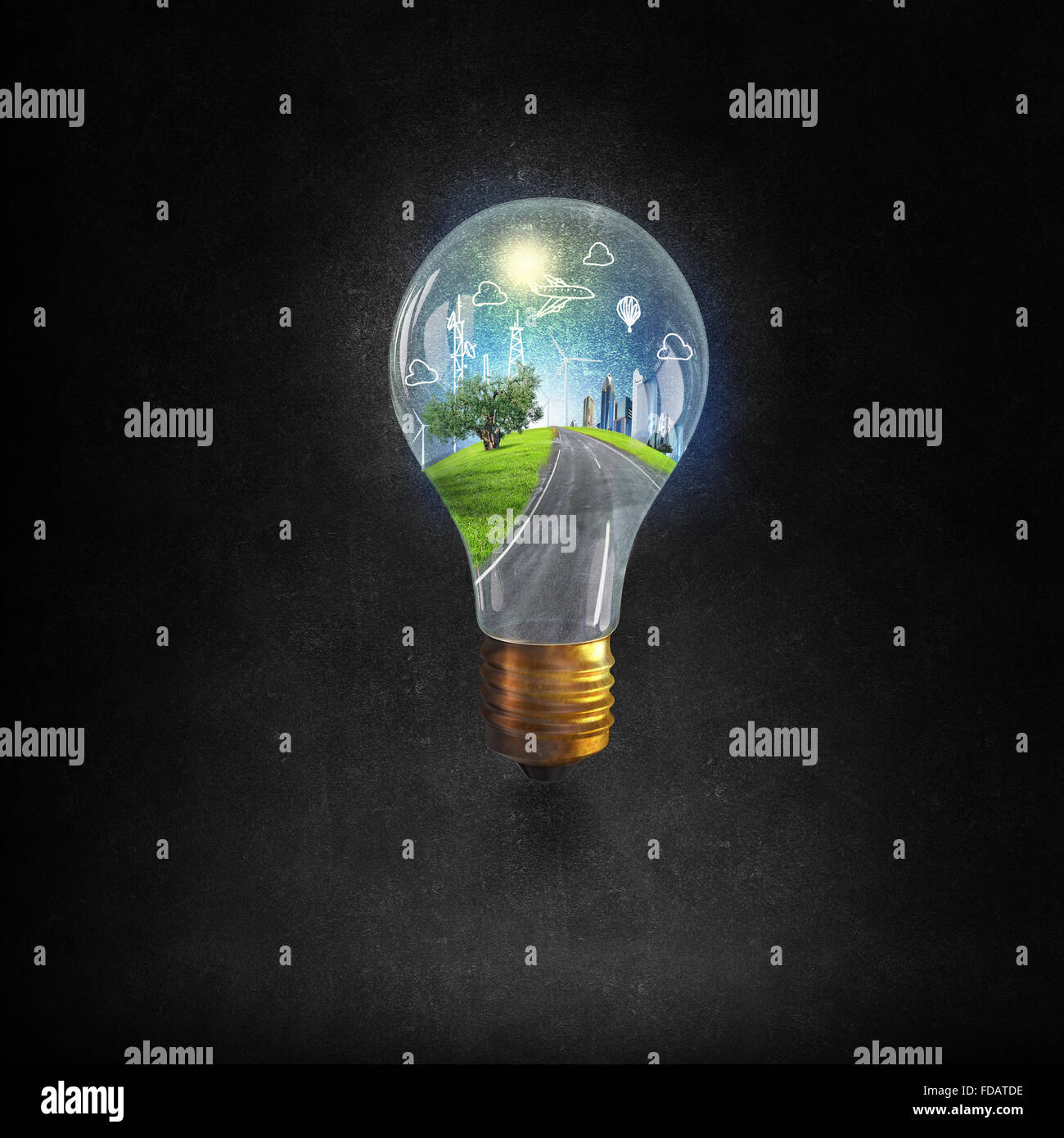 Think green concept with cityscape inside of light bulb Stock Photo - Alamy