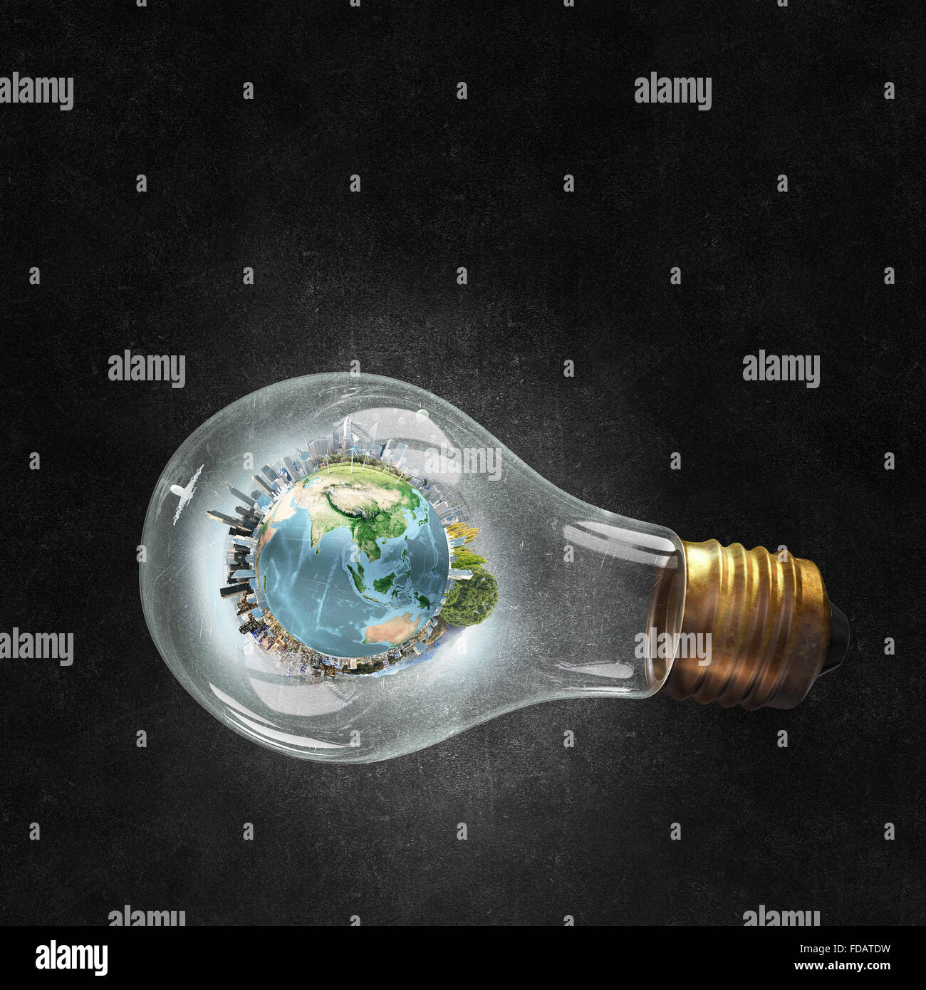 Planet Earth inside of light bulb. Elements of this image are furnished ...