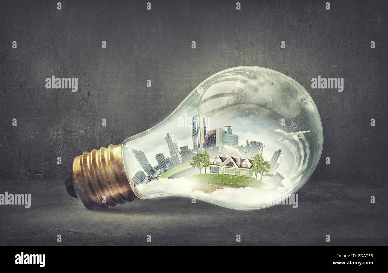 Think green concept with modern cityscape inside of light bulb Stock ...