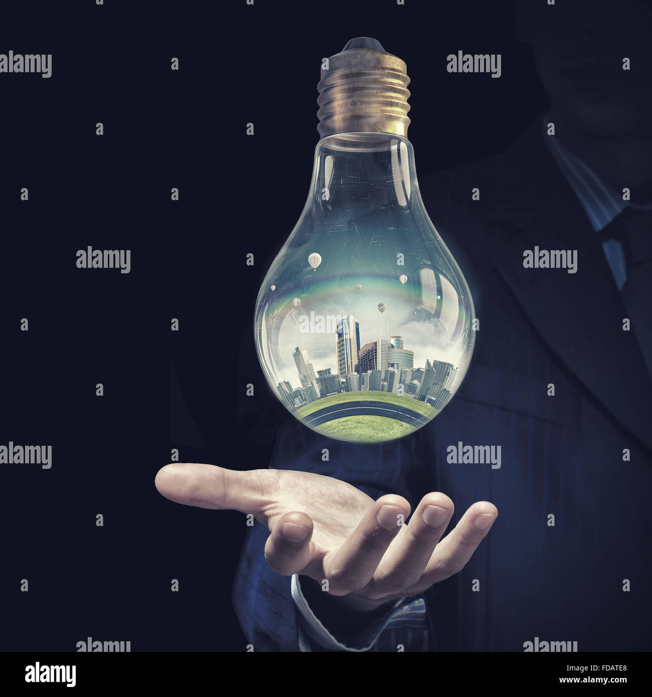 Think green concept with modern cityscape inside of light bulb Stock ...