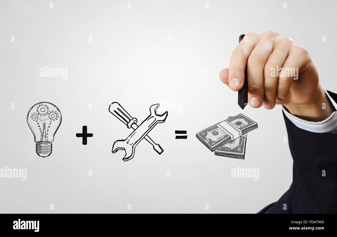 Close up of businessman drawing money making formula Stock Photo - Alamy