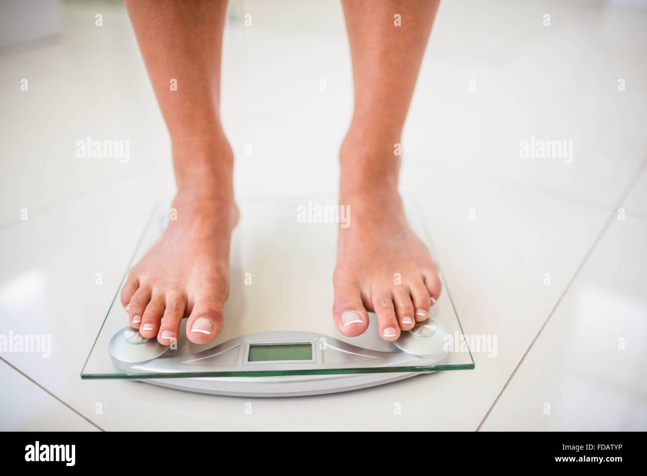 Weighing scale feet hi-res stock photography and images - Alamy
