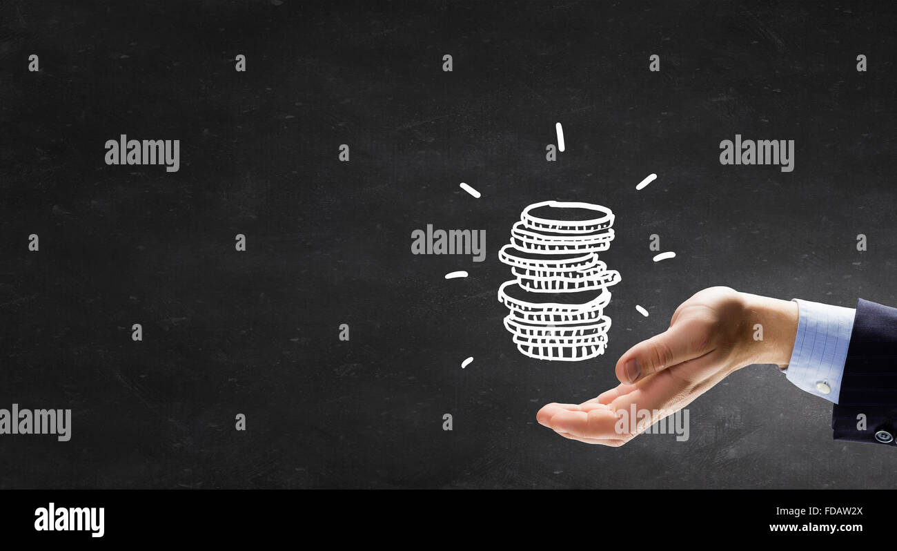 Businessman hand showing chalk drawn coins stack Stock Photo - Alamy