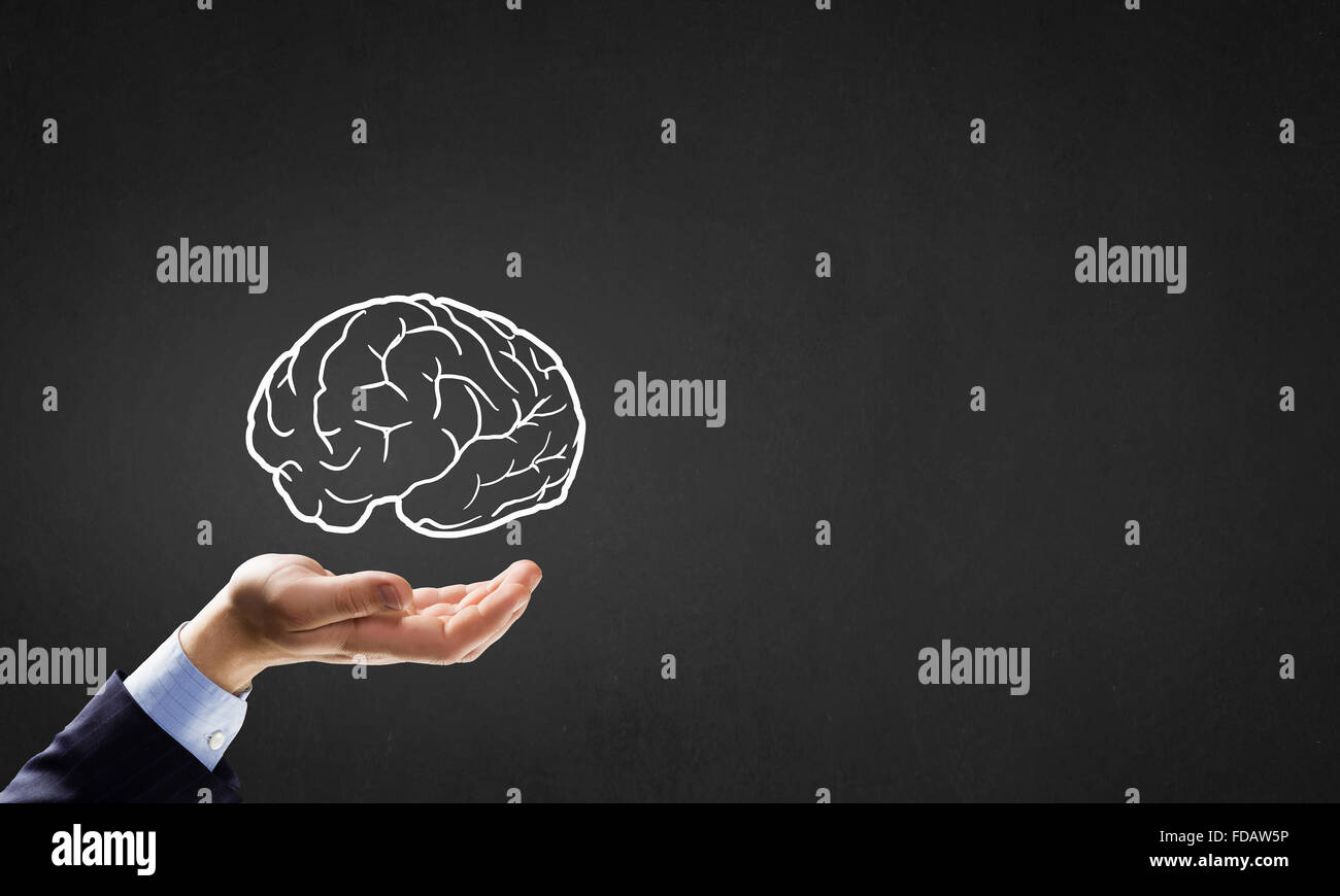 Person hand holding human brain in palm Stock Photo - Alamy