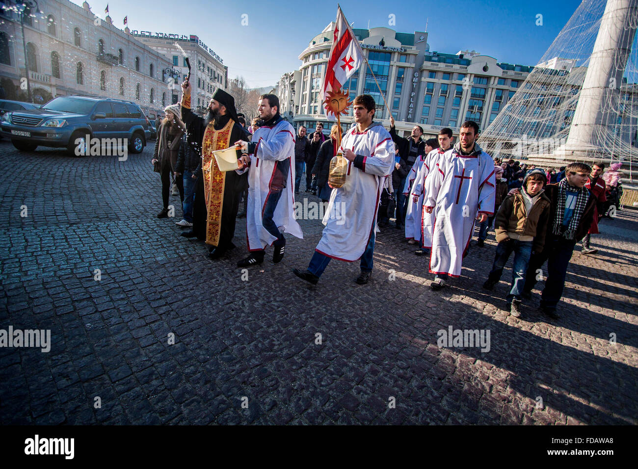 Georgian priest blessing with holy water during Alilo, Christmas ...