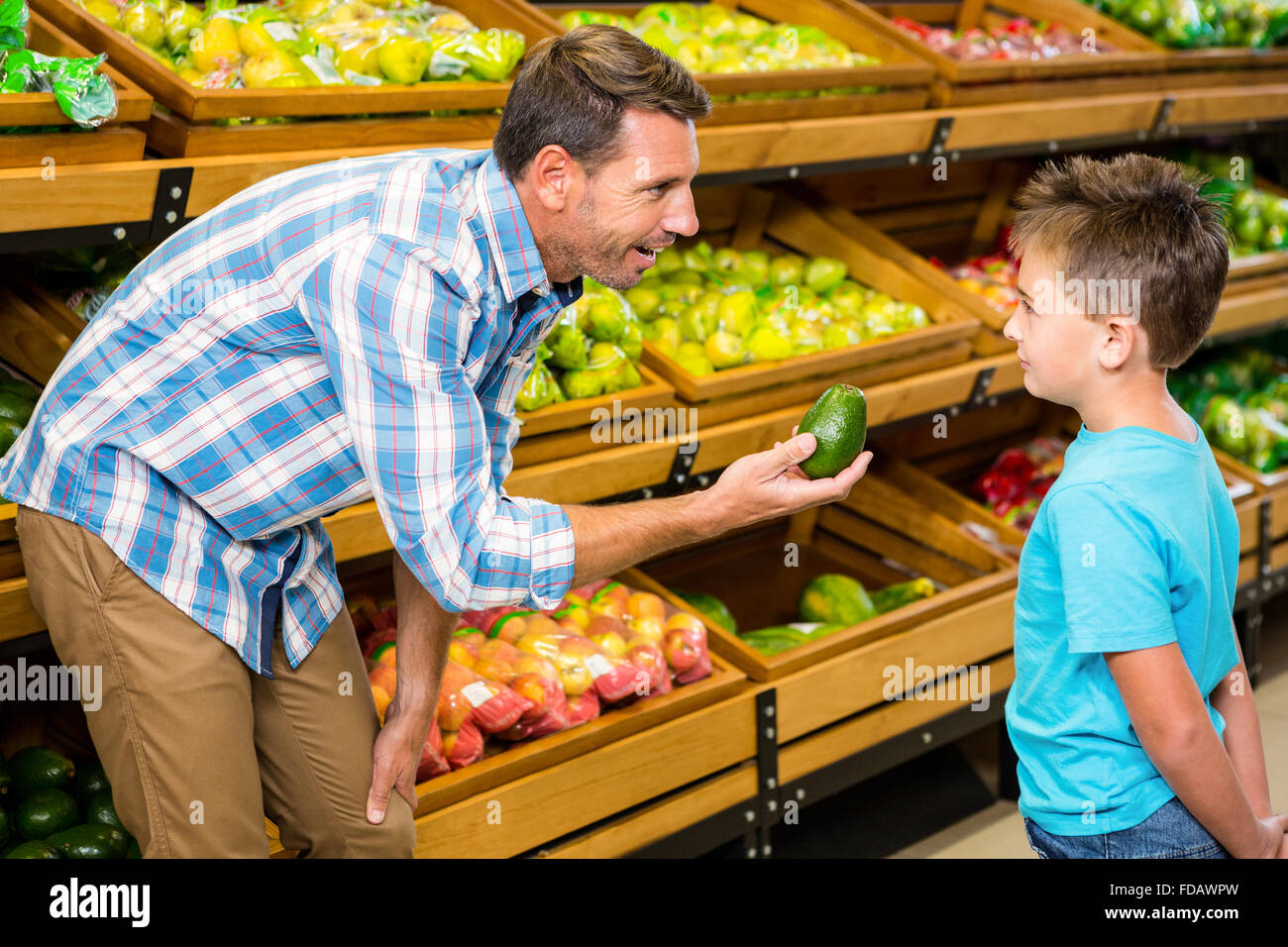 Father and son doing shopping Stock Photo - Alamy
