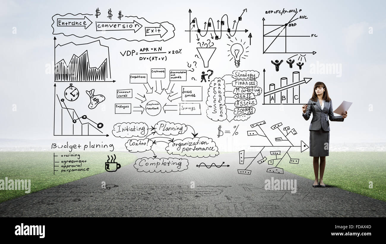 Young businesswoman drawing strategy plan on screen Stock Photo - Alamy