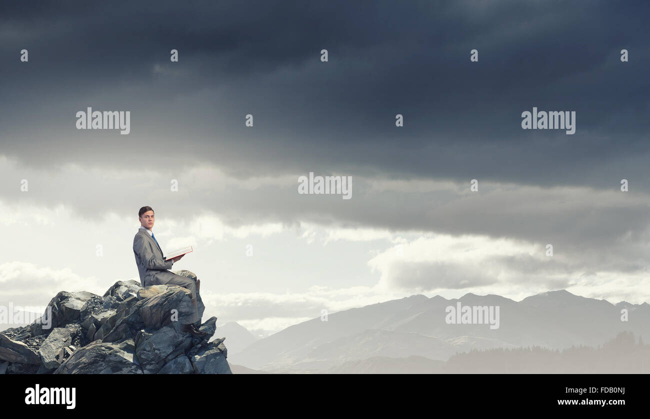 Businessman carrying rock hi-res stock photography and images - Alamy