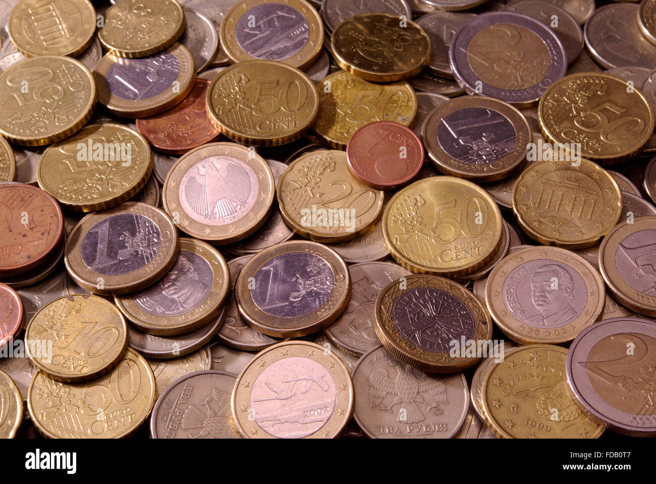 Scattering of coins Stock Photo - Alamy