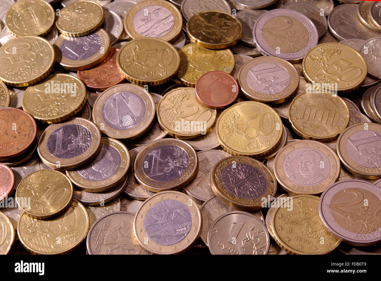 Scattering of coins Stock Photo - Alamy