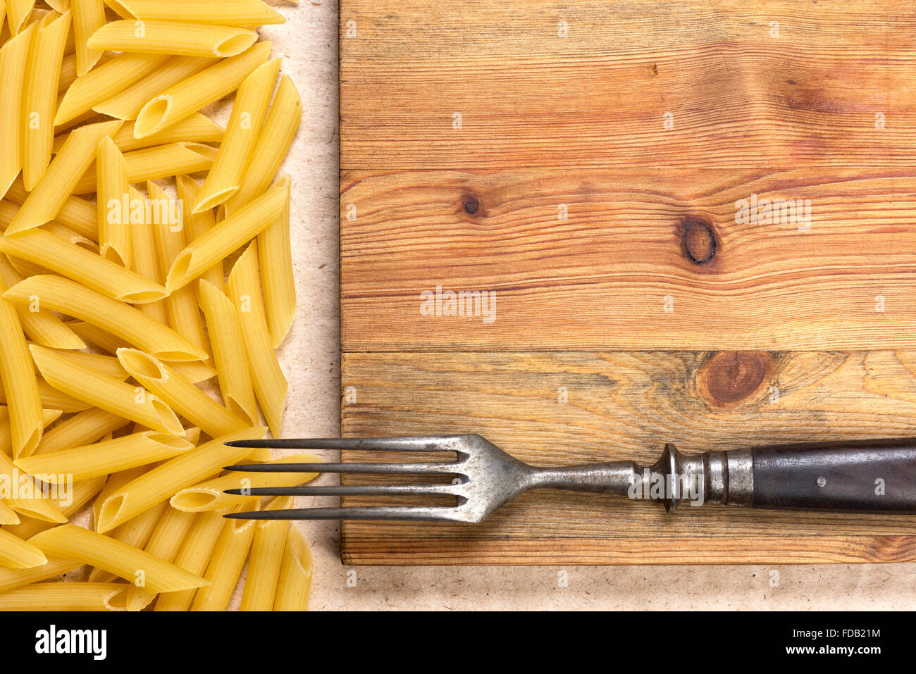 food background - pasta and rough colored paper Stock Photo - Alamy