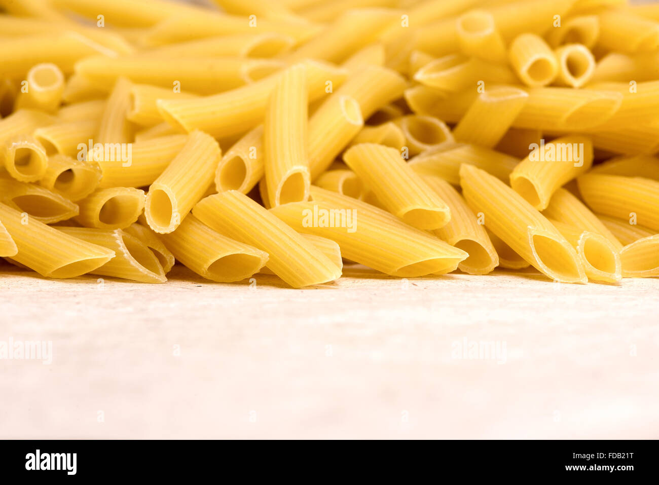 food background - pasta and rough colored paper Stock Photo - Alamy