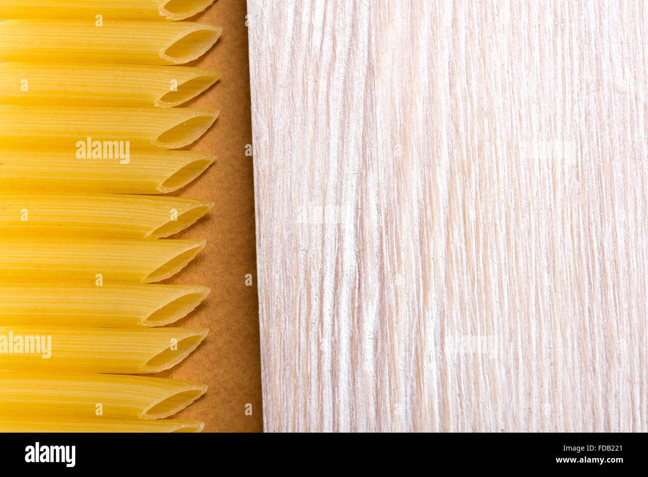 food background - pasta and rough colored paper Stock Photo - Alamy
