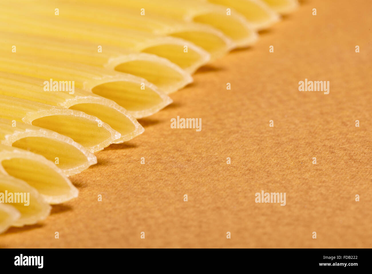 food background - pasta and rough colored paper Stock Photo - Alamy