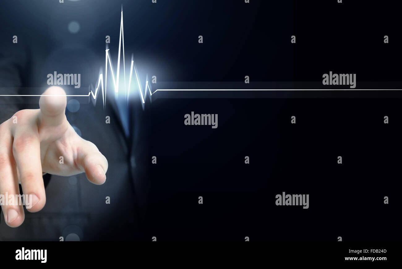 Male hand touch heart pulse on futuristic interface Stock Photo - Alamy