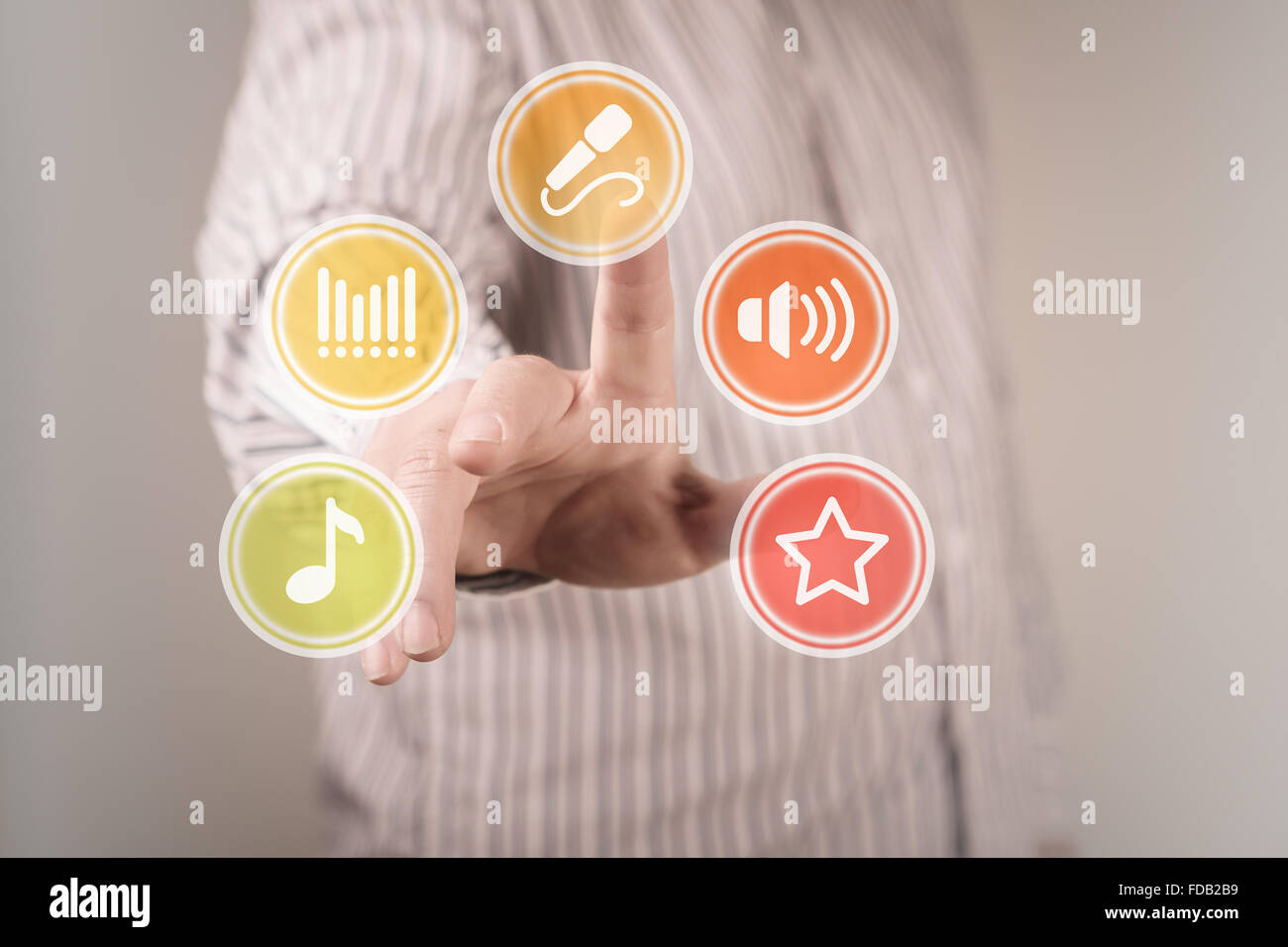 Close up of hand touching music icon with finger Stock Photo - Alamy