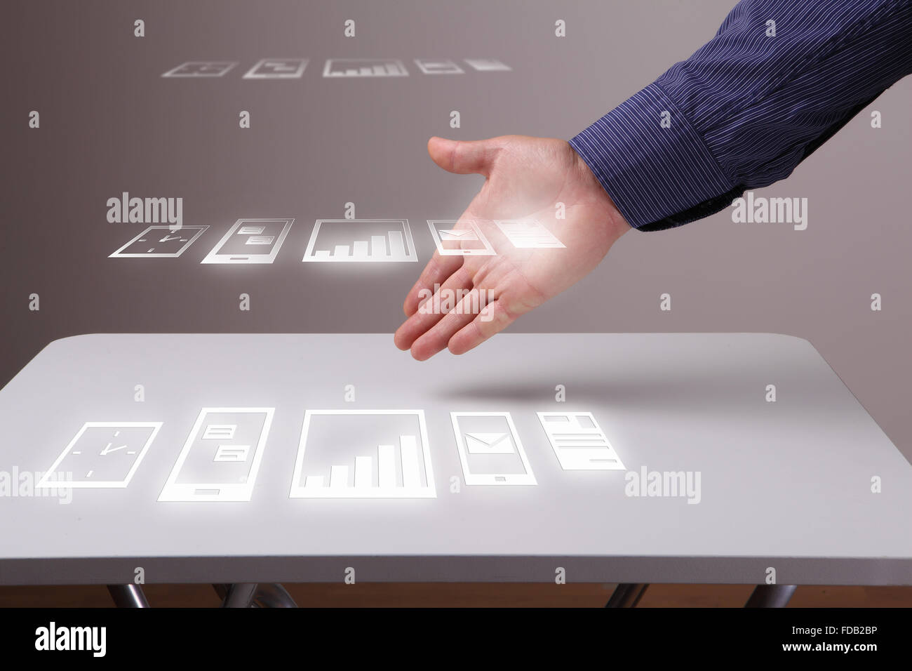 Hand of businessman presenting icons on virtual screen Stock Photo - Alamy