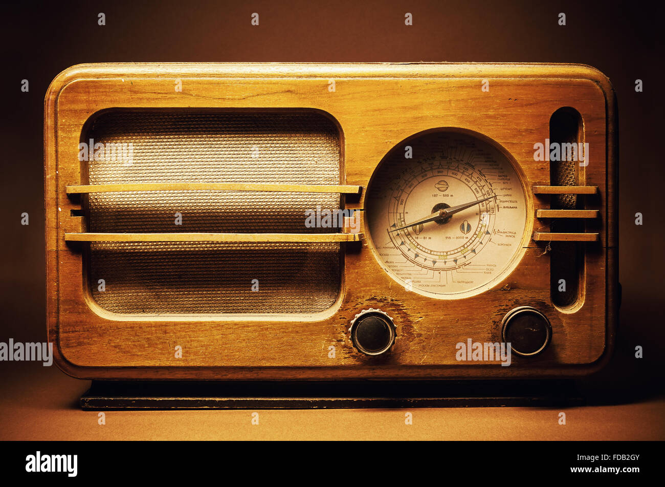 Design of an old wooden radio device. Names of European towns written ...