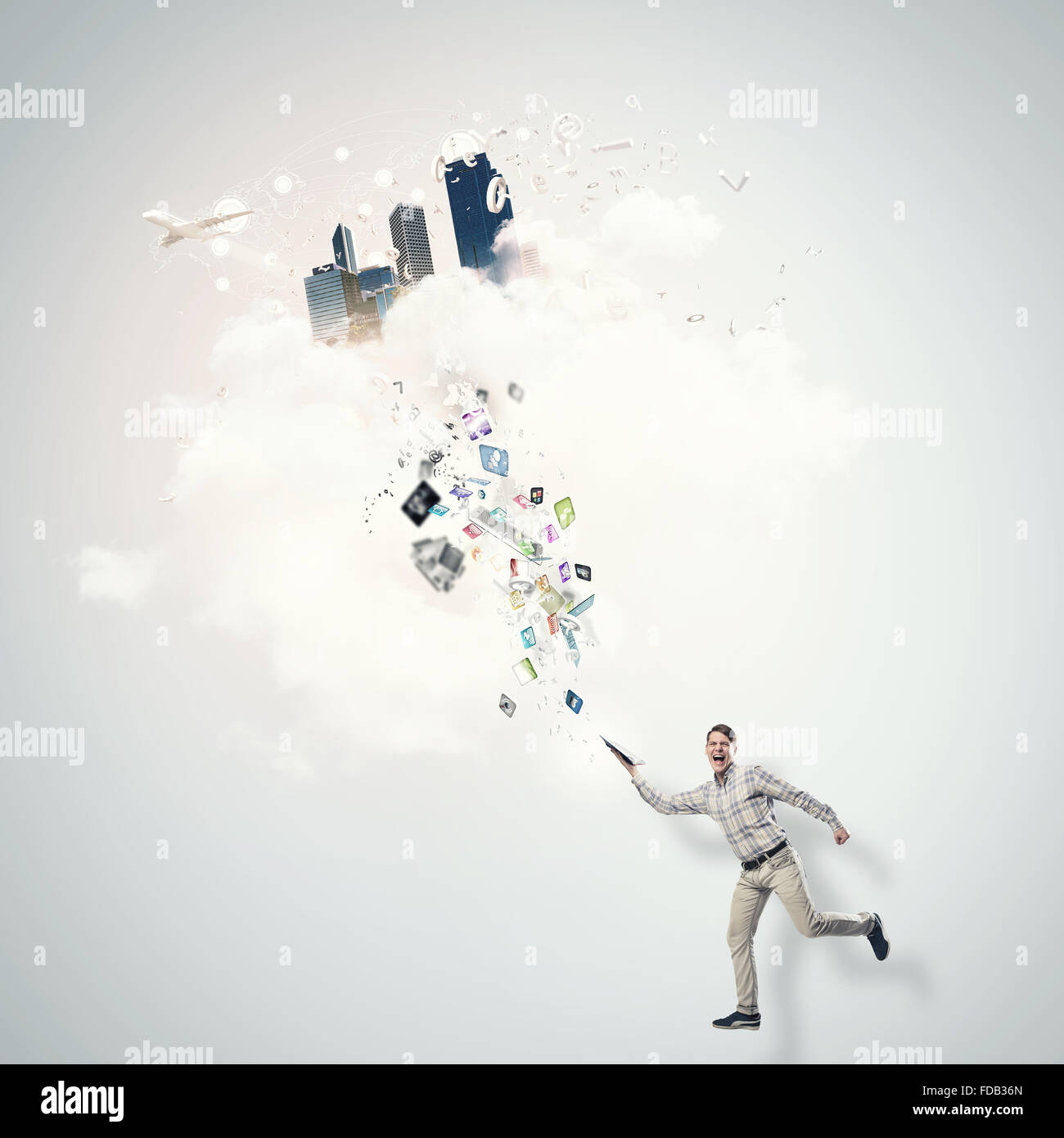 Full length of student running with book in hand Stock Photo - Alamy