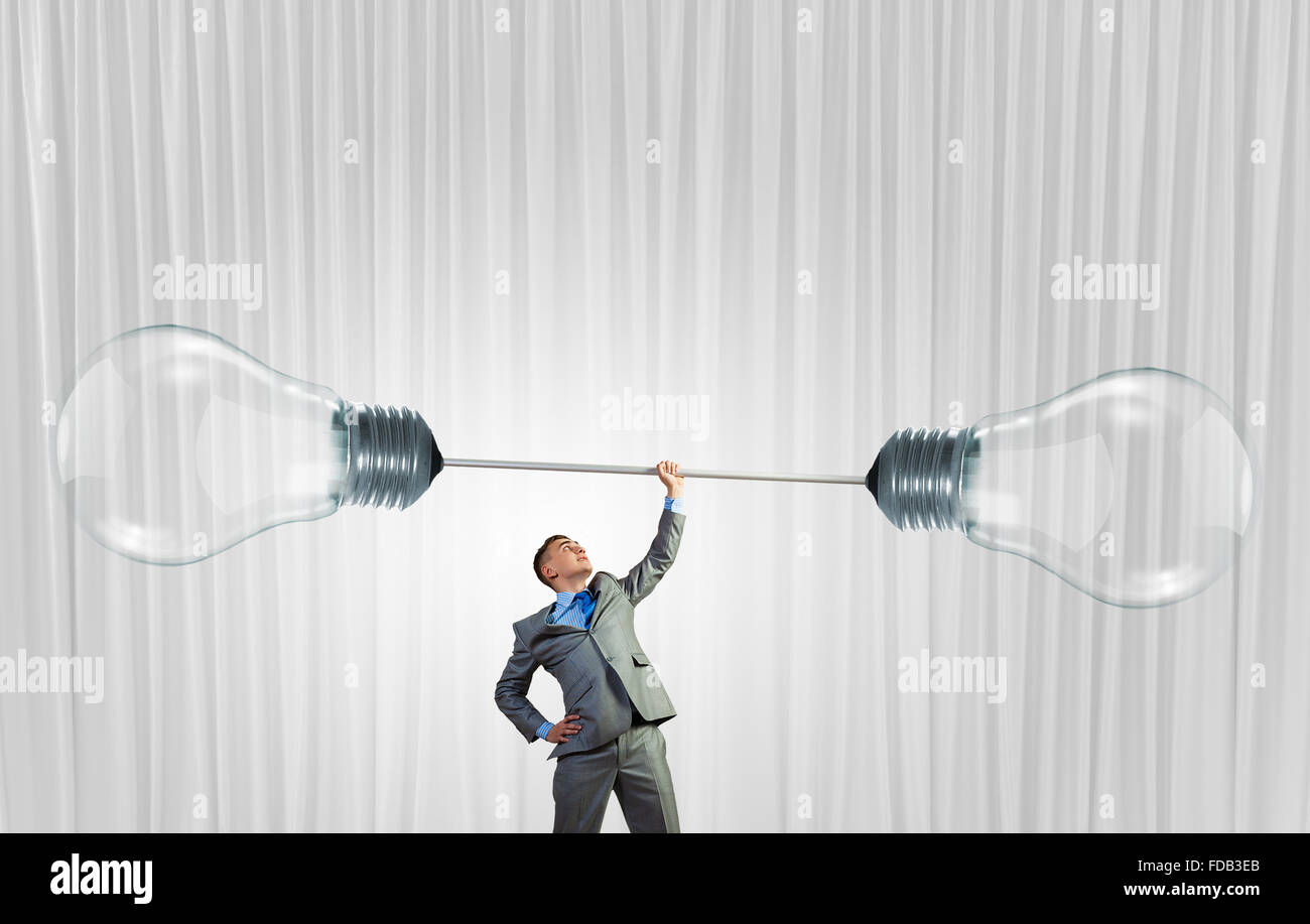 Confident man lifting above hi-res stock photography and images - Alamy
