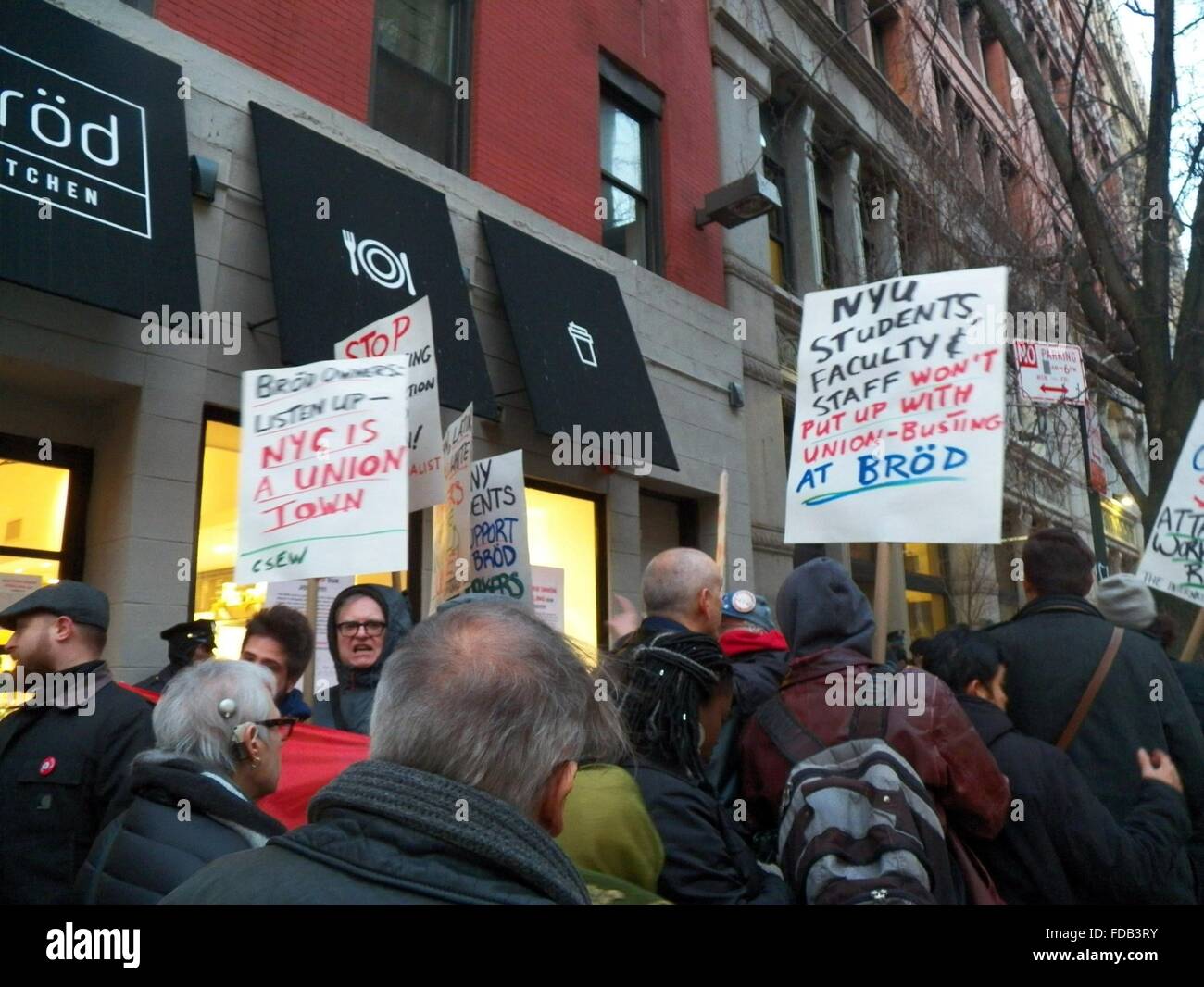 New York, United States. 29th Jan, 2016. Protesters with banners gather ...