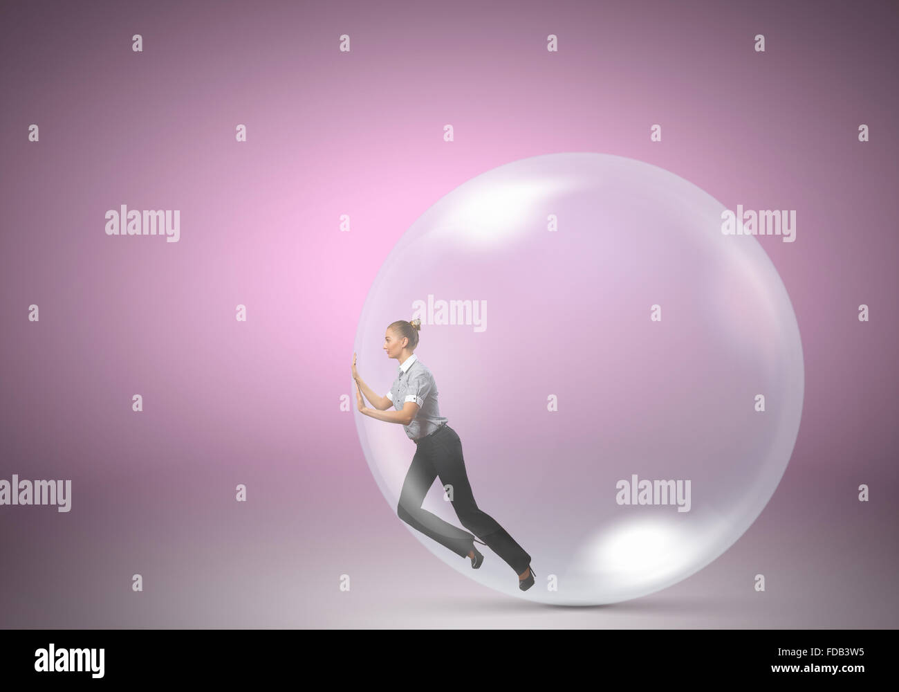 Young businesswoman trying to get out of soap bubble Stock Photo - Alamy