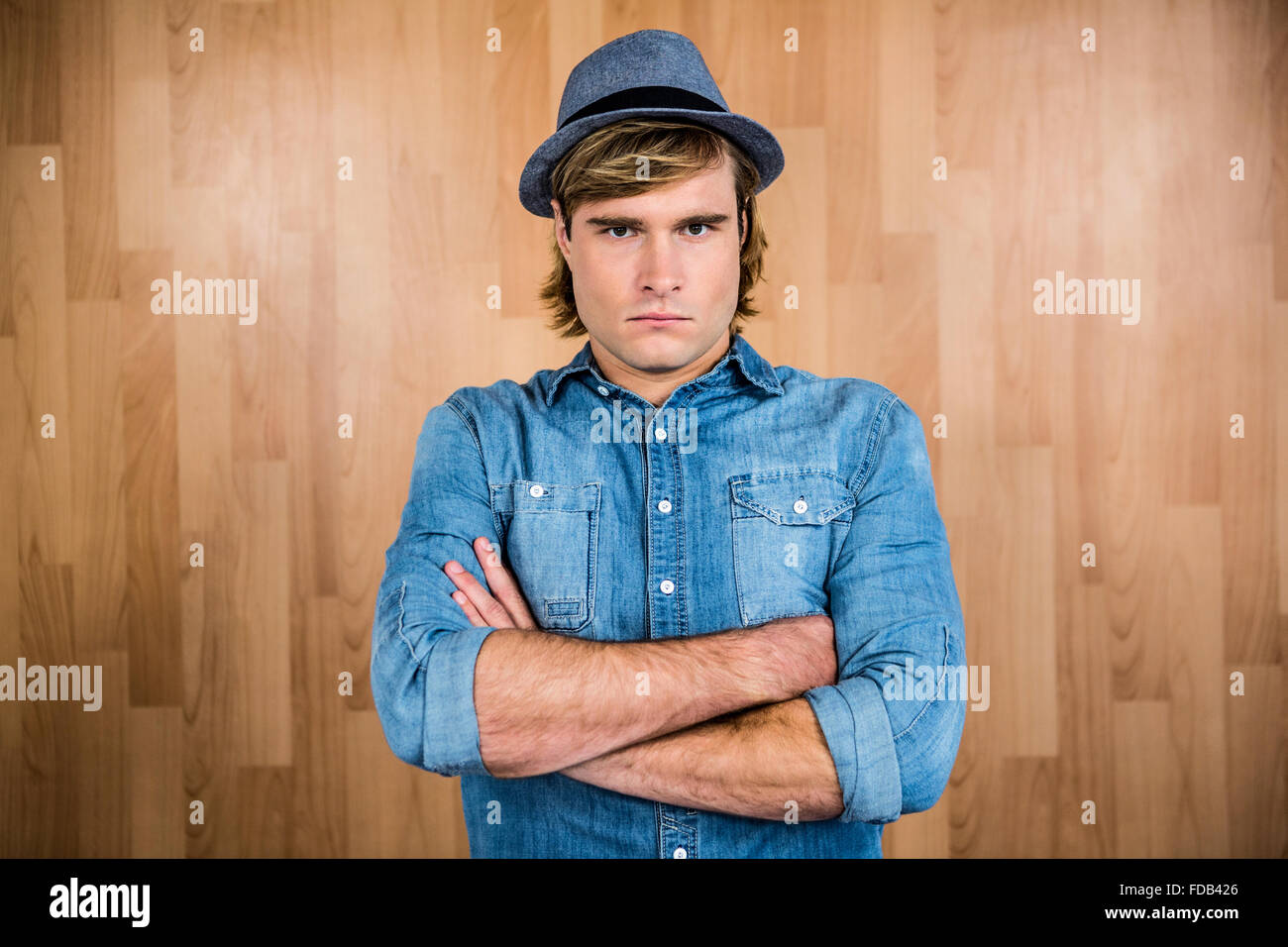 Angry blonde hipster crossing arms Stock Photo - Alamy