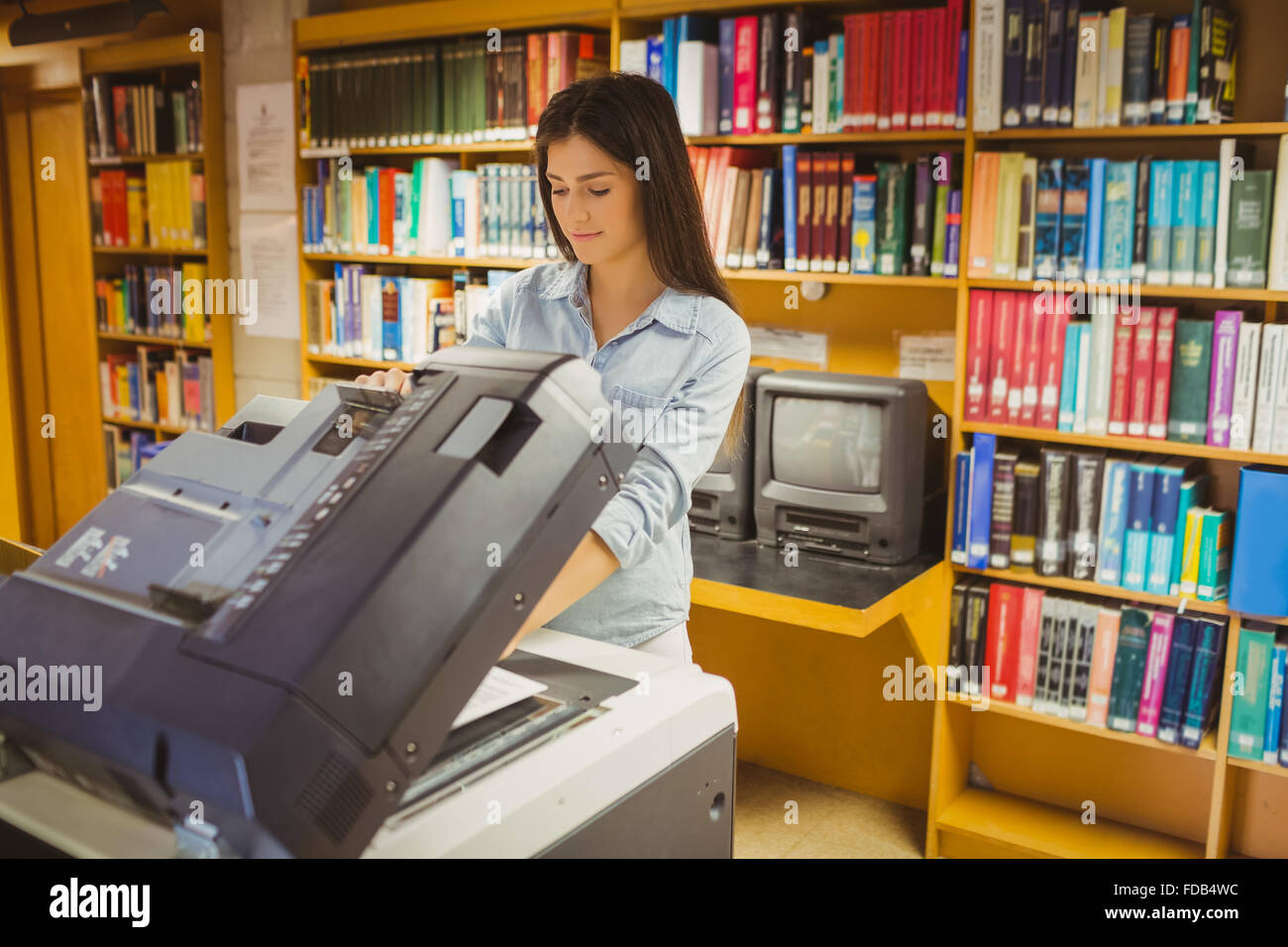 Woman photocopying hi-res stock photography and images - Alamy