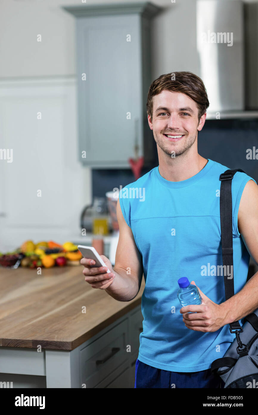 Healthy man sending text messages Stock Photo - Alamy