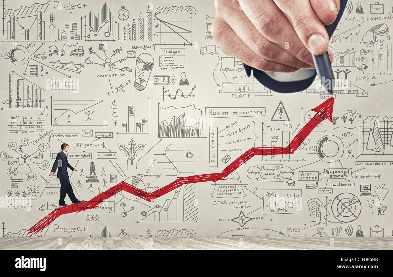 Businessman walking on rising graph arrow and sketches on background ...