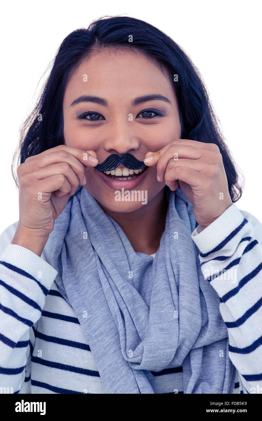 Pretty Asian woman with fake mustache posing for camera Stock Photo - Alamy