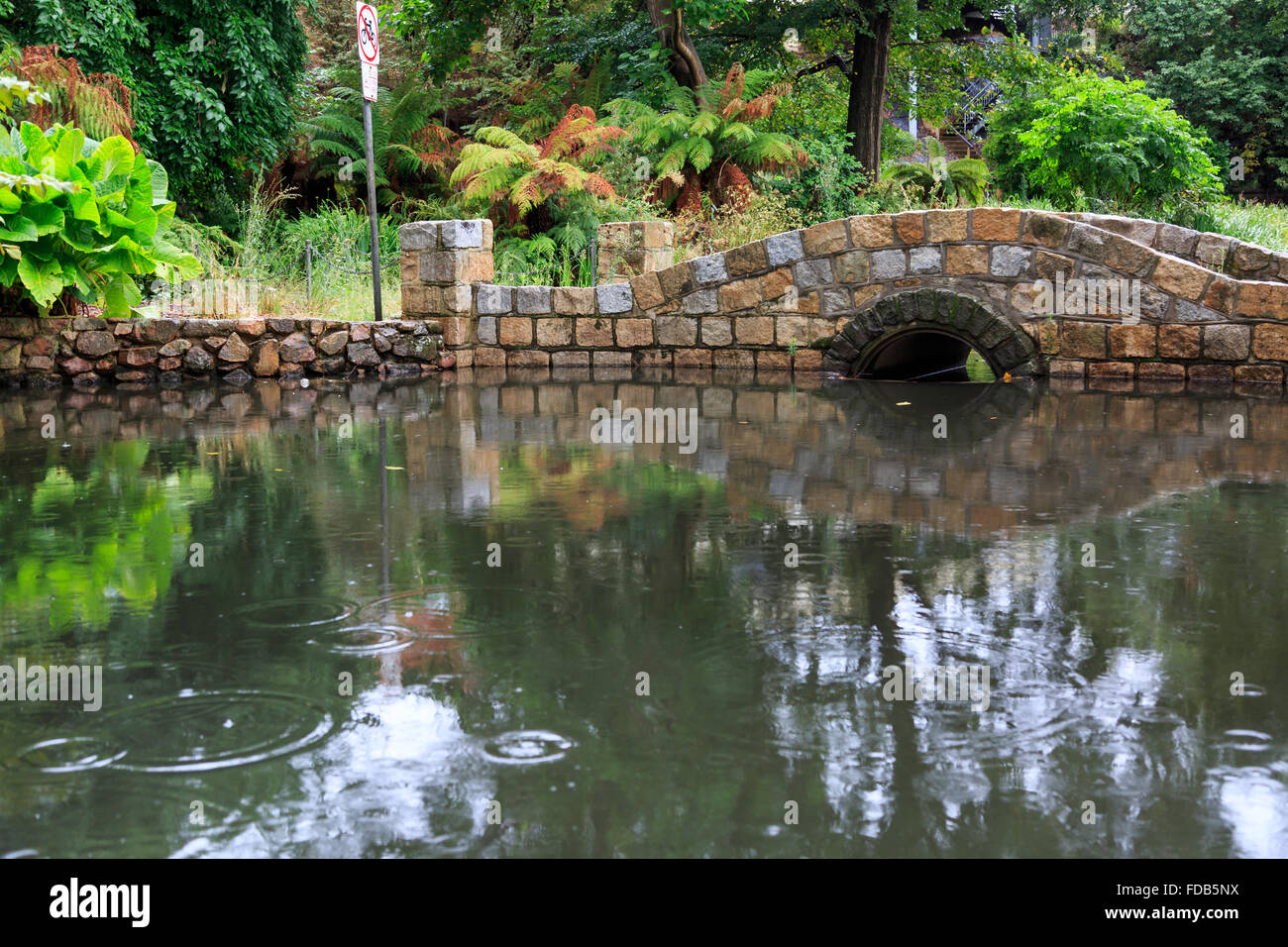 Stone bridge over pond in hi-res stock photography and images - Alamy