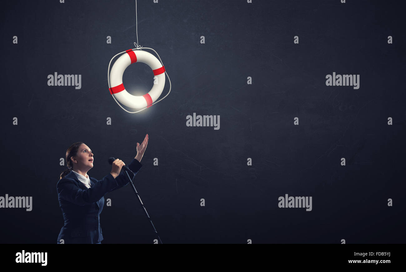Woman reporter with microphone gesturing with hand Stock Photo - Alamy