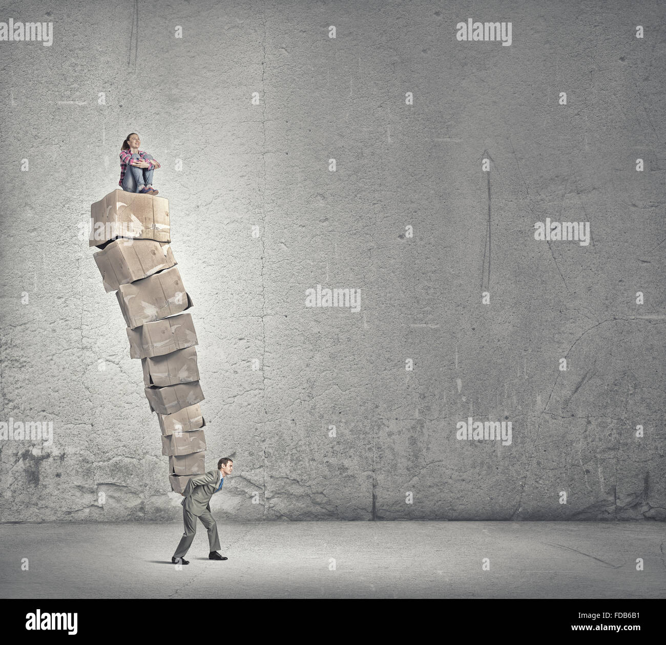 Businessman carrying big stack of carton boxes Stock Photo - Alamy