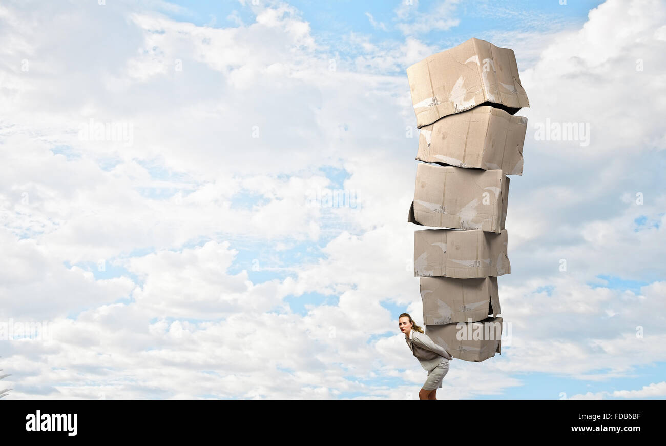 Woman carrying stack of cardboard boxes hi-res stock photography and ...