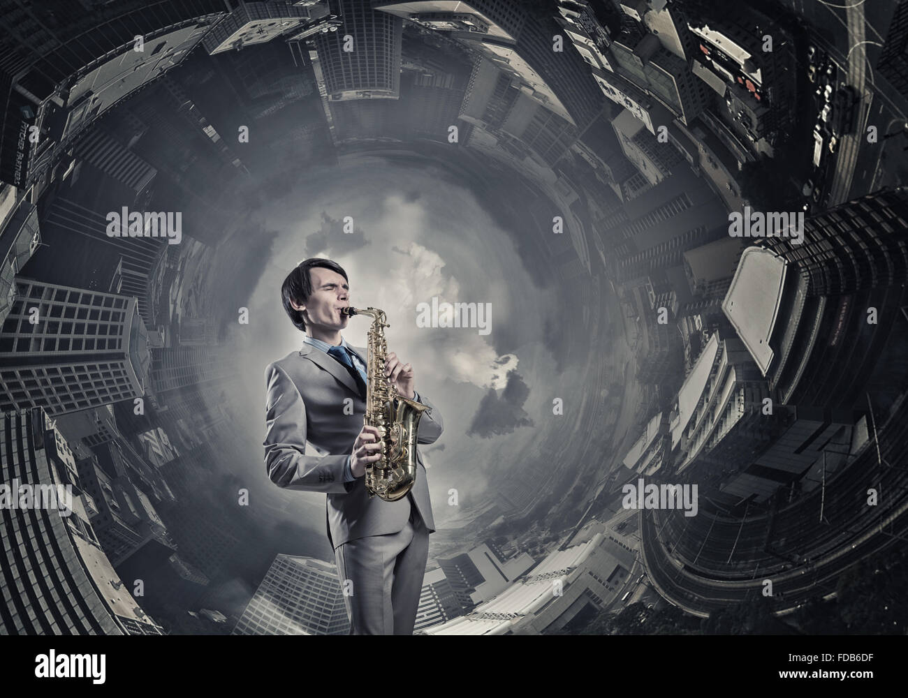 Young man playing saxophone on cityscape background Stock Photo - Alamy