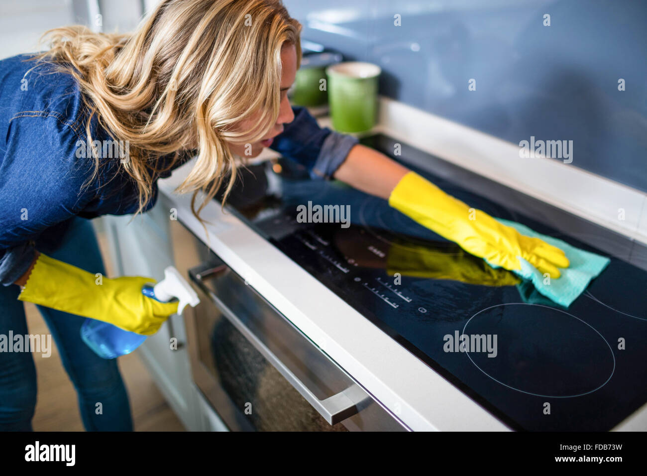 Woman cleaning up Stock Photo - Alamy