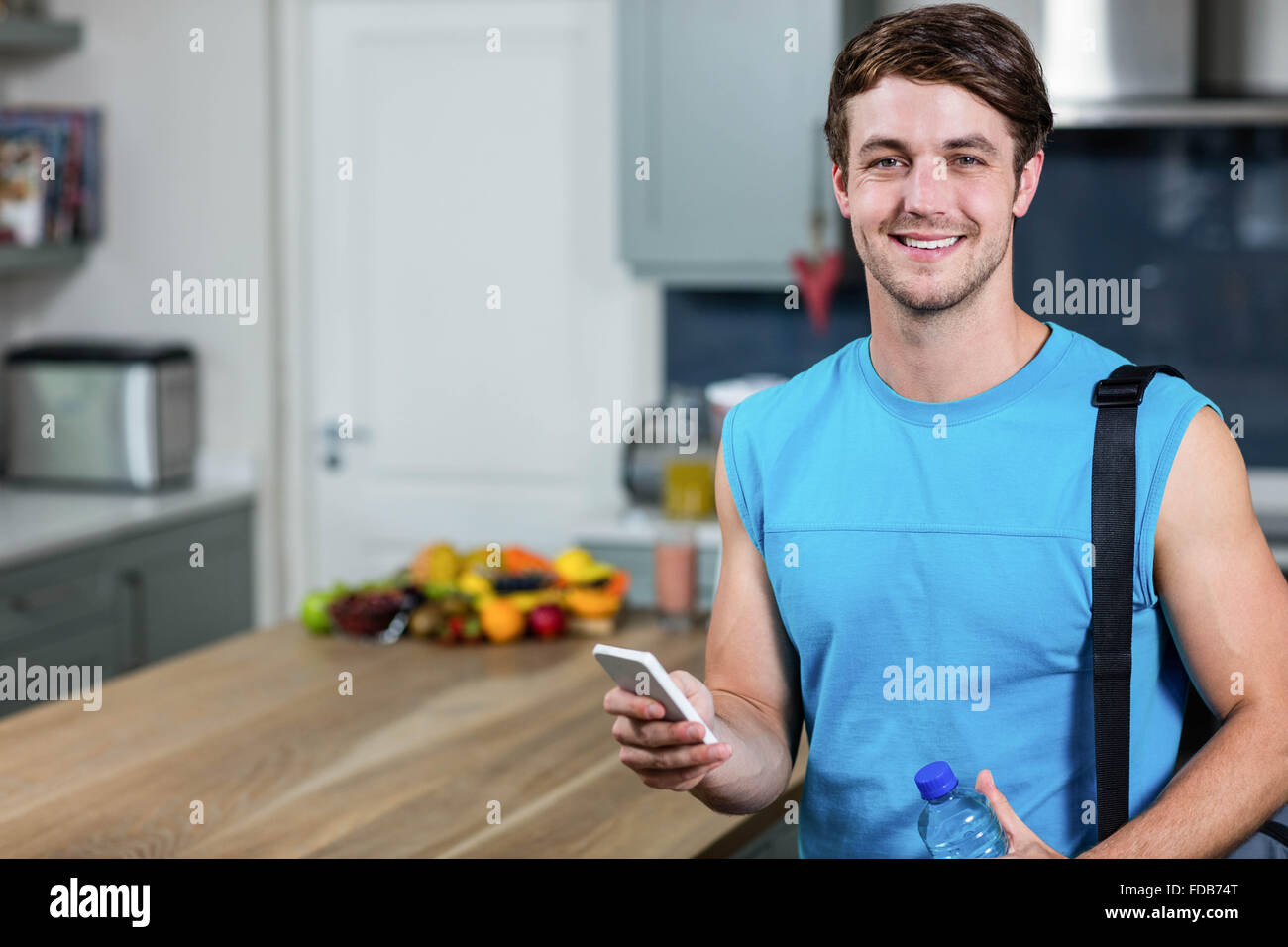 Healthy man sending text messages Stock Photo - Alamy