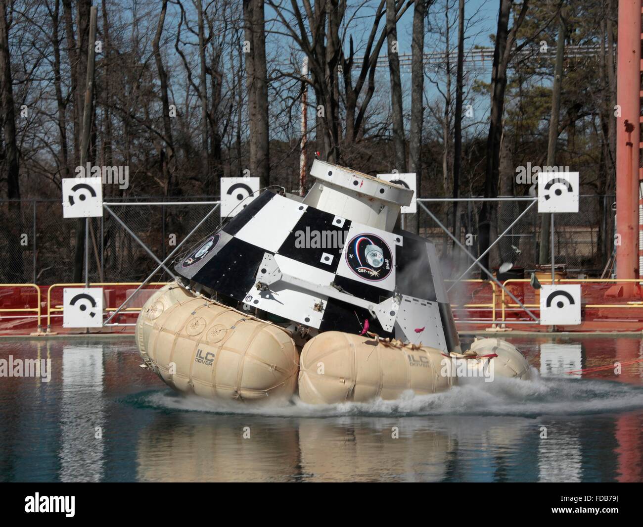 The Boeing CST-100 spacecraft mock-up undergoes a water drop test at ...