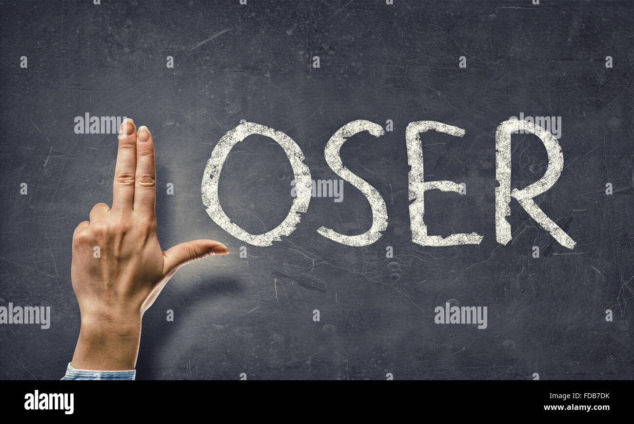 Loser word and human fingers instaed of letter L Stock Photo - Alamy