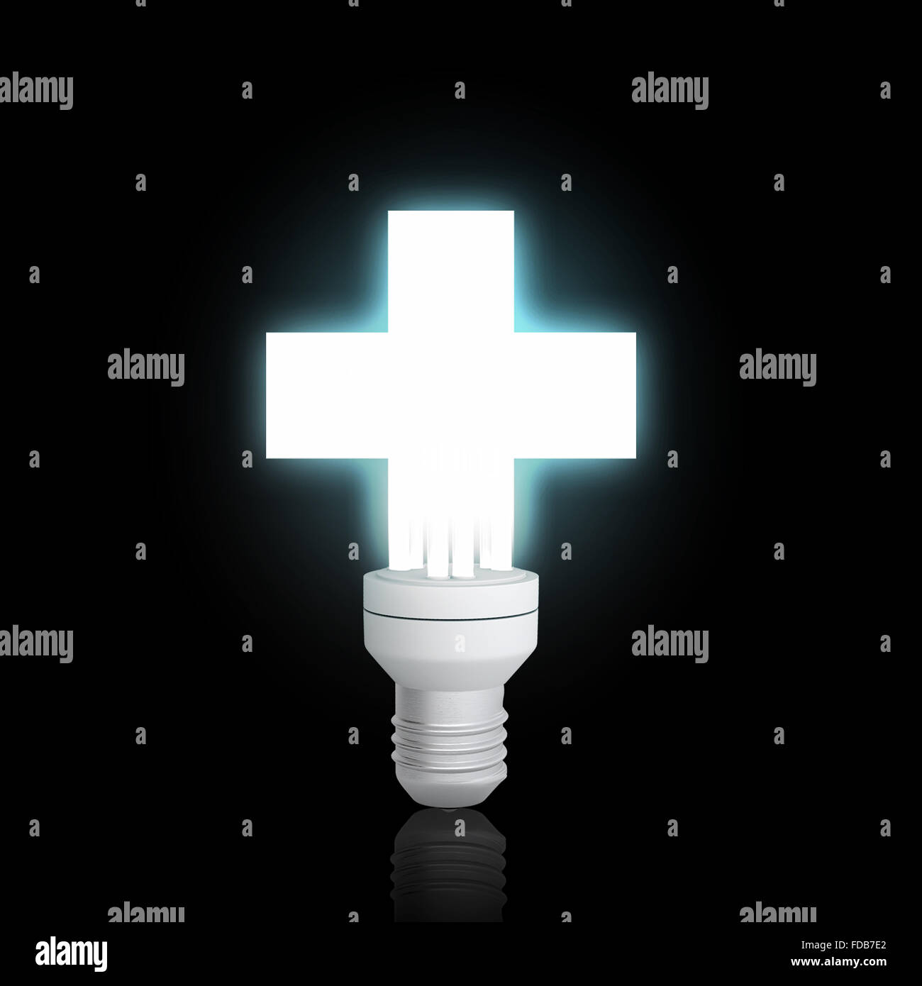 Cross light bulb glowing icon on dark background Stock Photo - Alamy