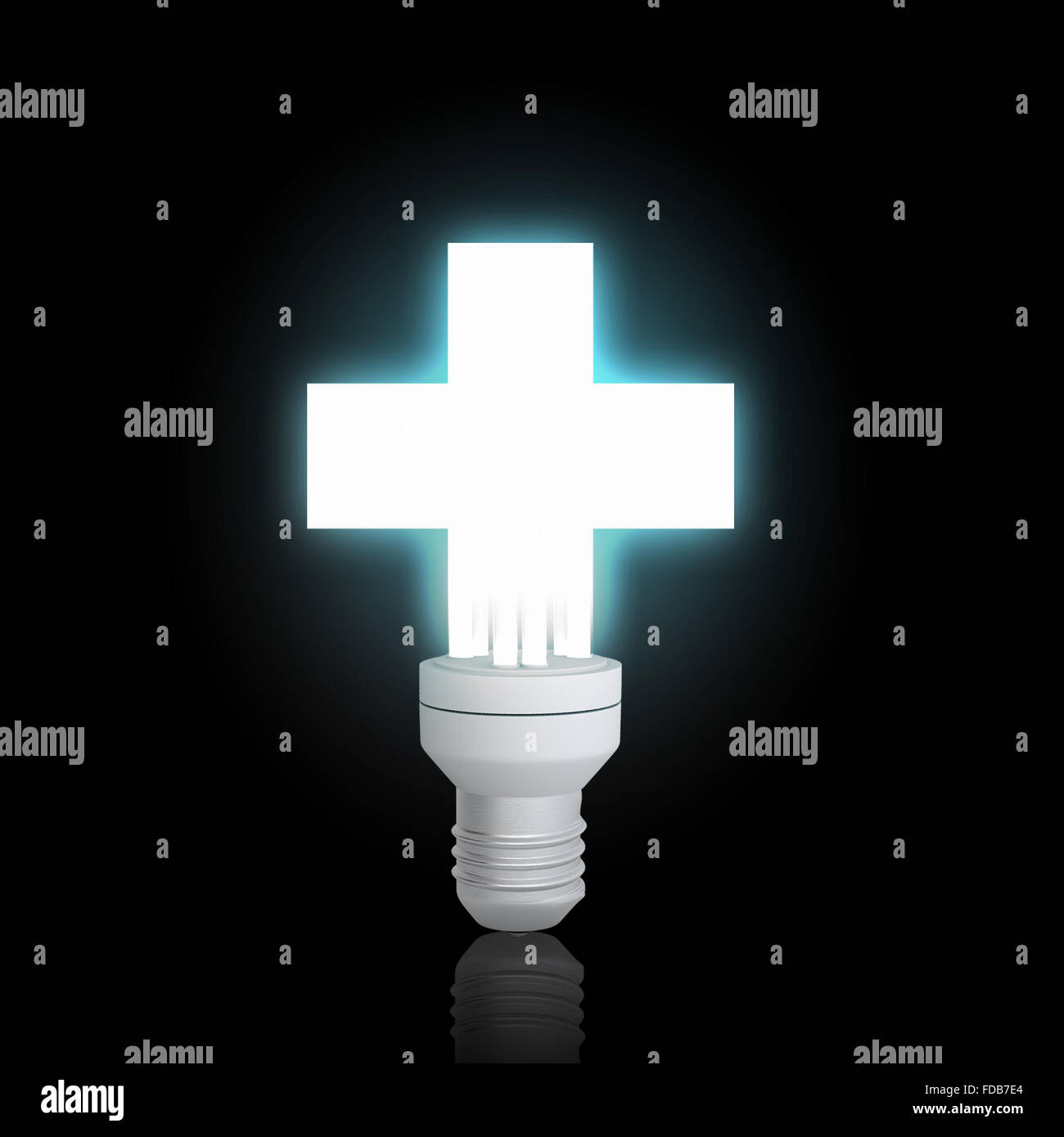 Cross light bulb glowing icon on dark background Stock Photo - Alamy